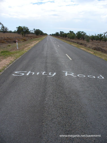Shity Road | Pavement graffiti